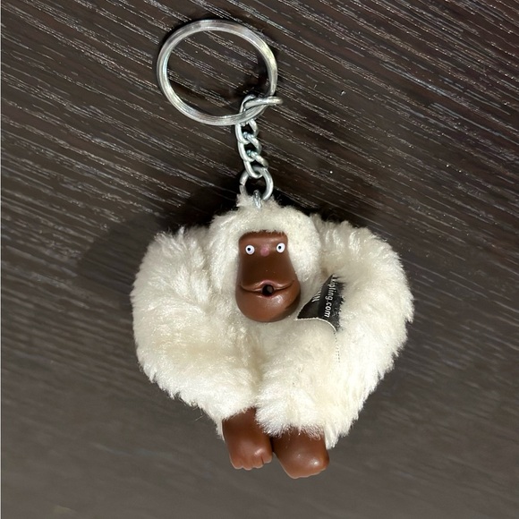 Kipling | Accessories | Excellent Kipling Key Chain Charm Cream Color ...